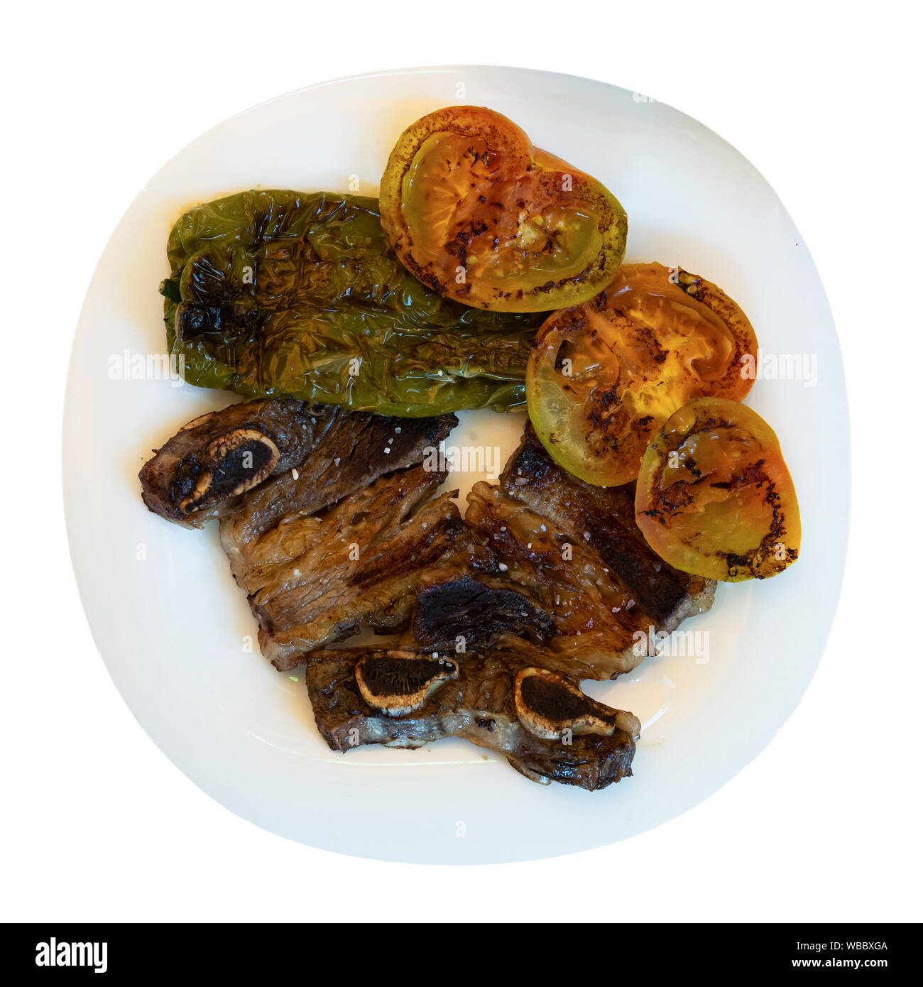 Top view of traditional Galician Churrasco - grilled beef short ribs ...