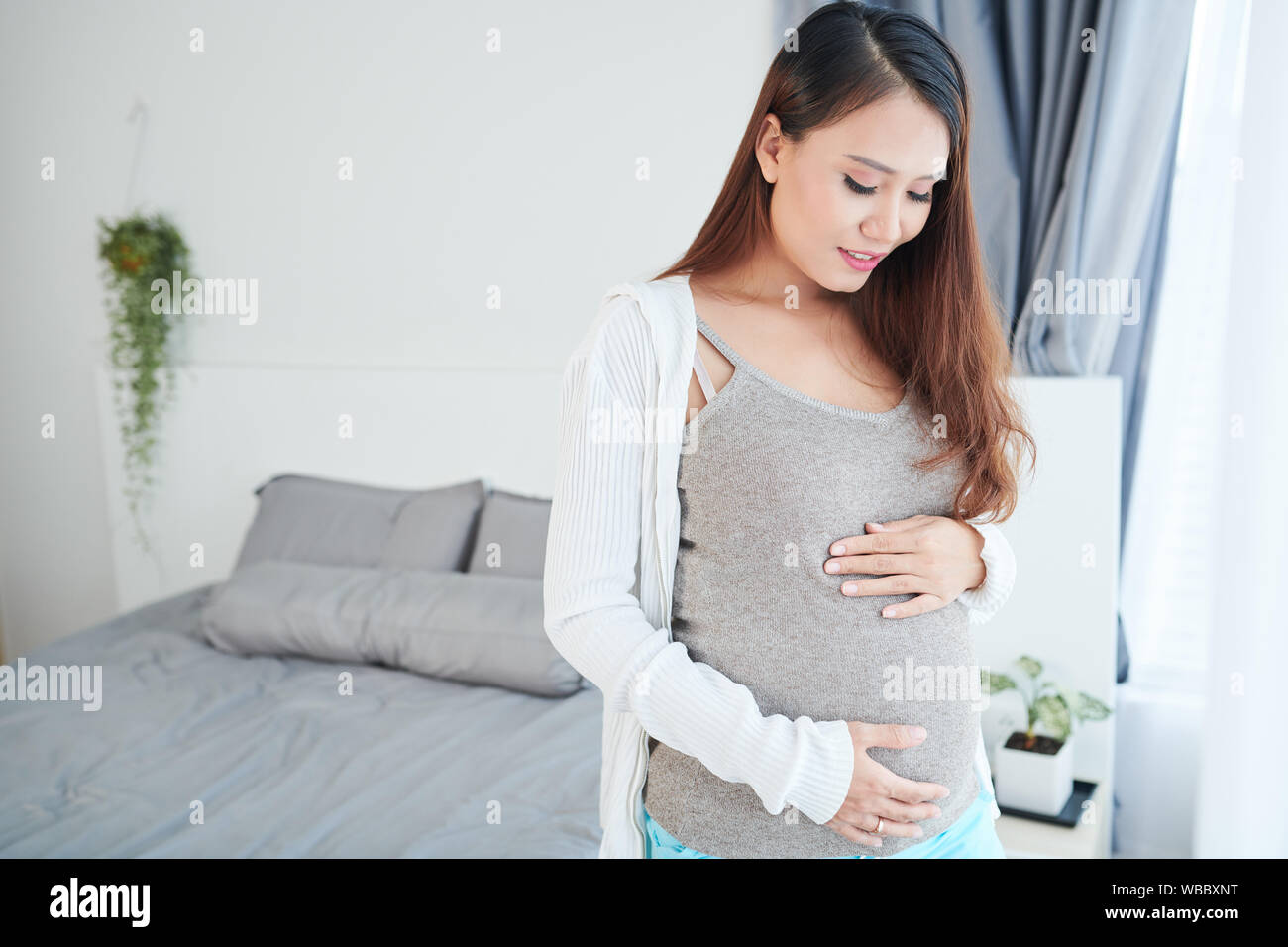 Big baby bump hi-res stock photography and images - Alamy