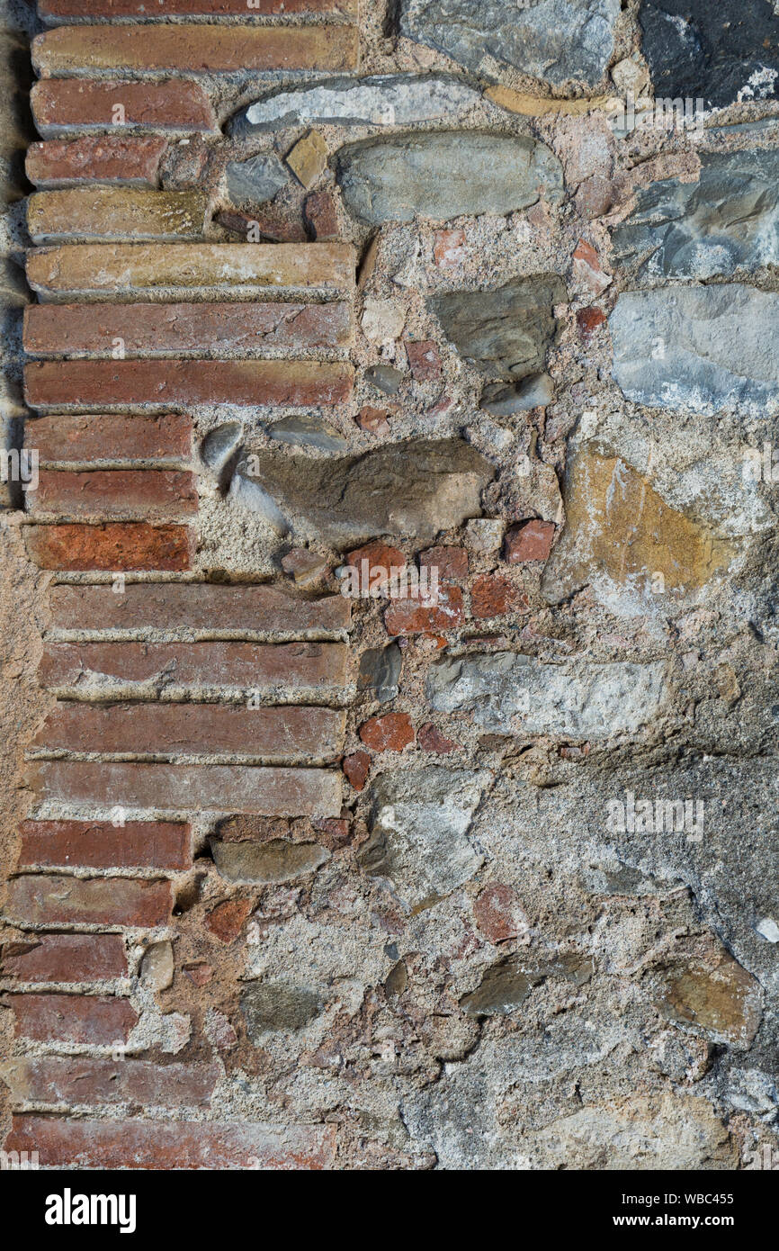 Old damaged stone wall surface texture Stock Photo - Alamy