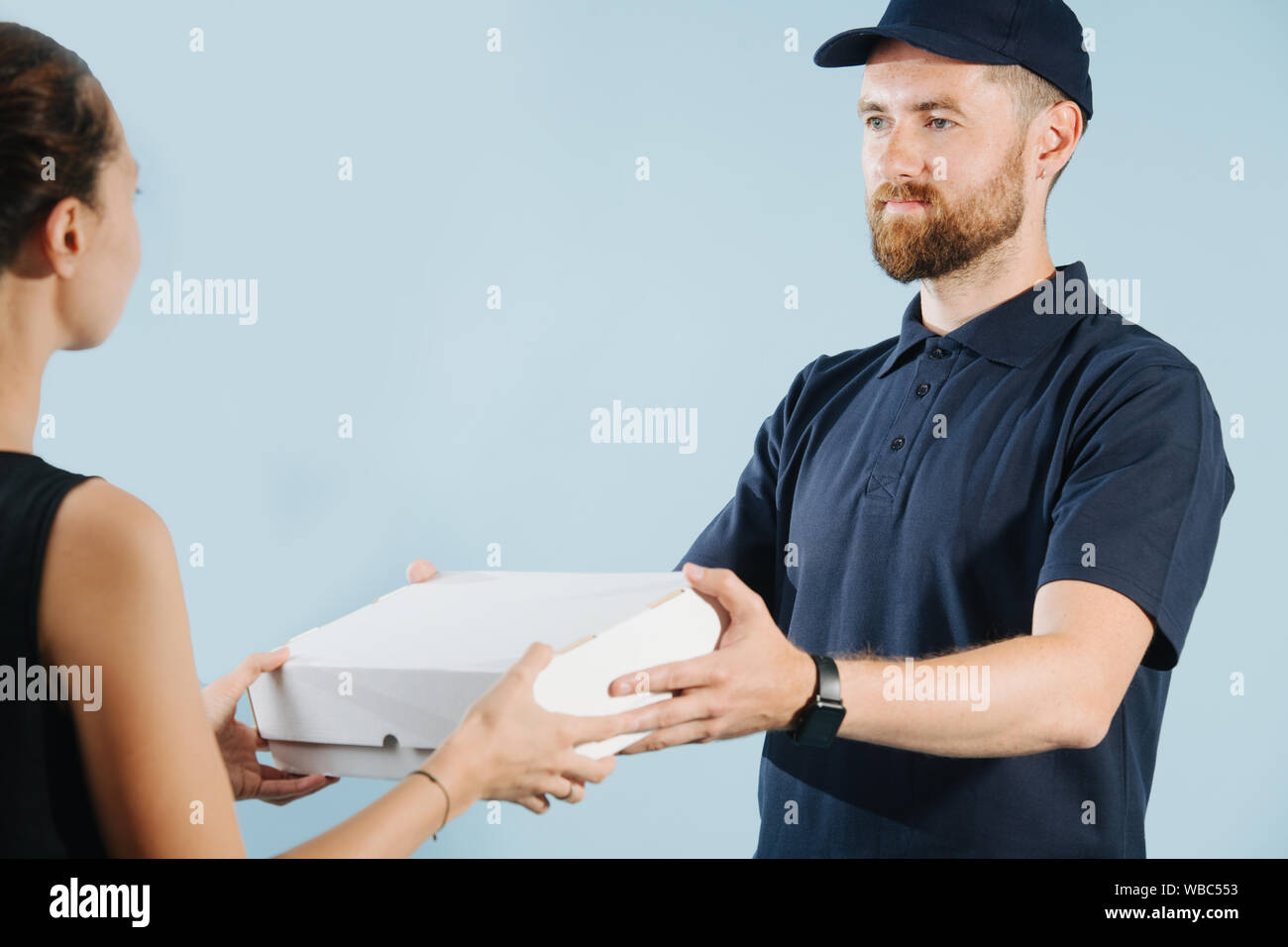 Woman taking delivery not pizza hi-res stock photography and images - Alamy