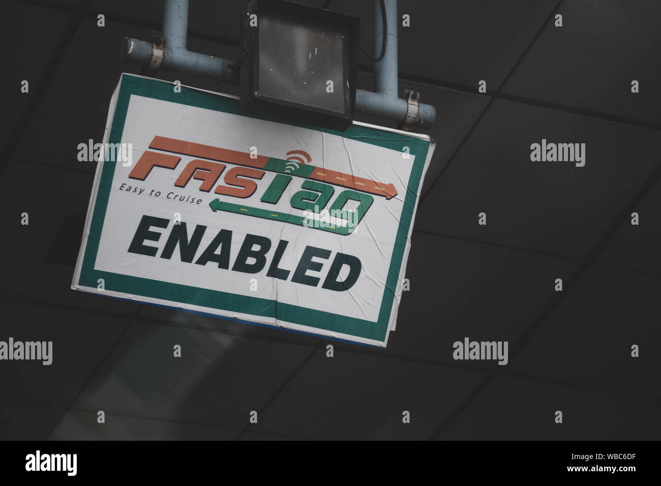 Fast Tag logos at a motorway or highway in India Stock Photo - Alamy