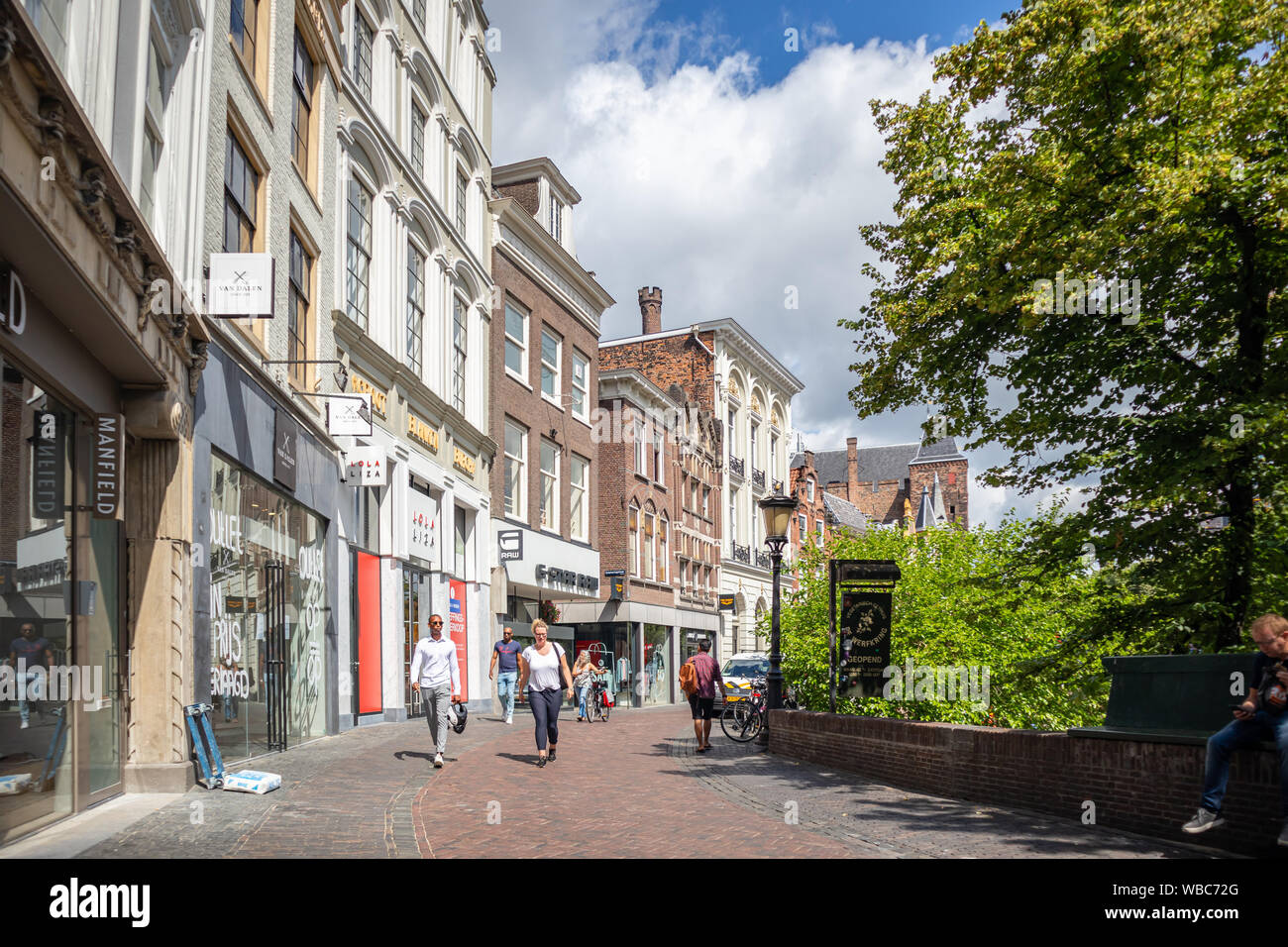 Utrecht, Netherlands - JULY 01, 2019: People walking on paved city ...