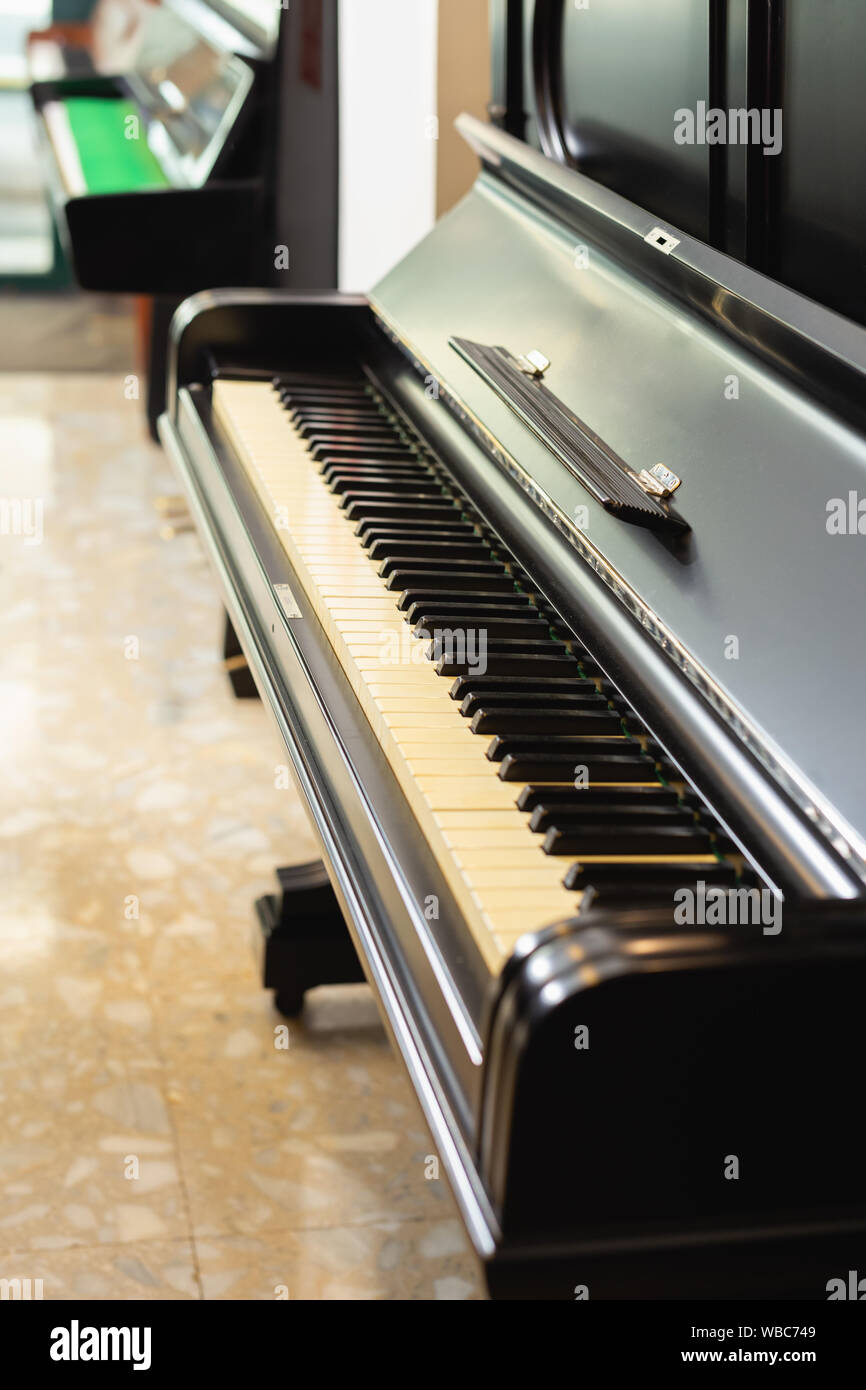 Old wood musical instruments in a music store Stock Photo - Alamy