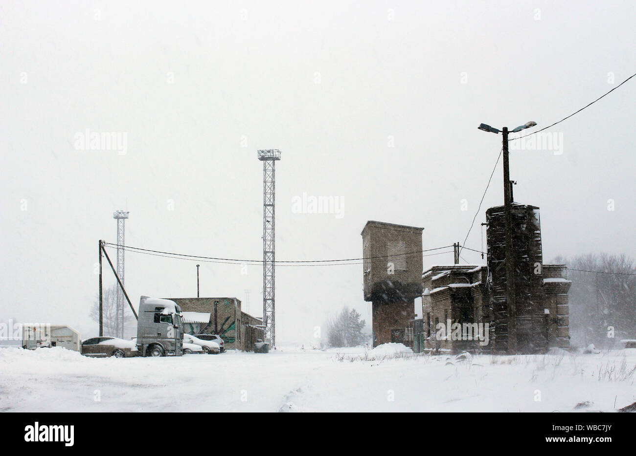 snowy industrial winter landscape with buildings Stock Photo - Alamy