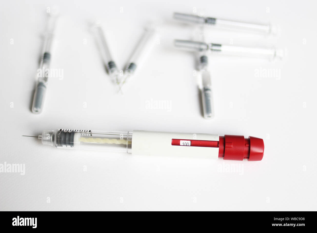 Ivf needle and pills hi-res stock photography and images - Alamy
