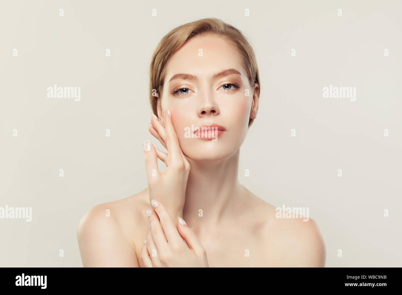 Beautiful female face with perfect natural clear skin. Healthy spa ...