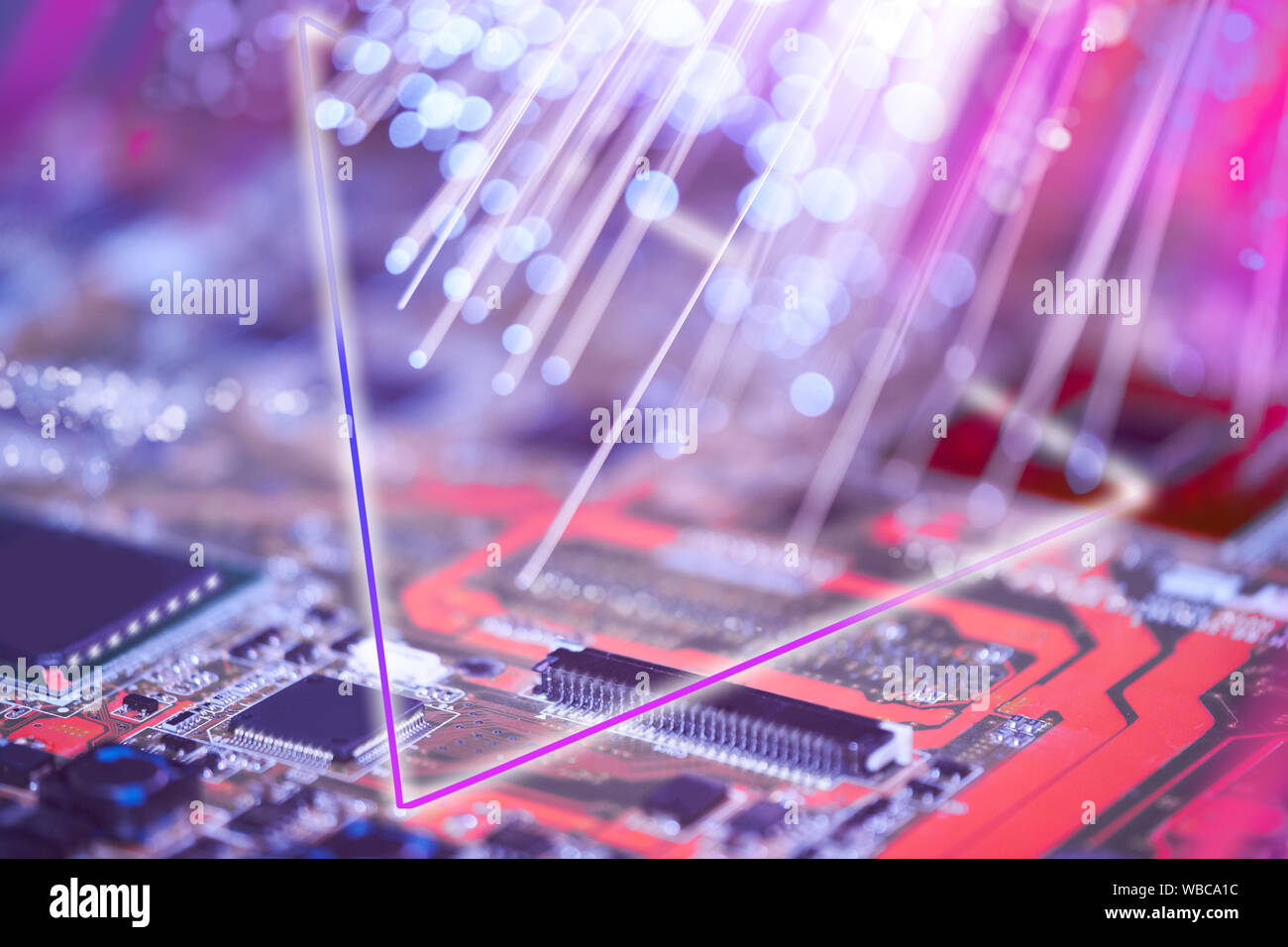 Closeup on electronic board and neon electric lights, blurred and toned ...