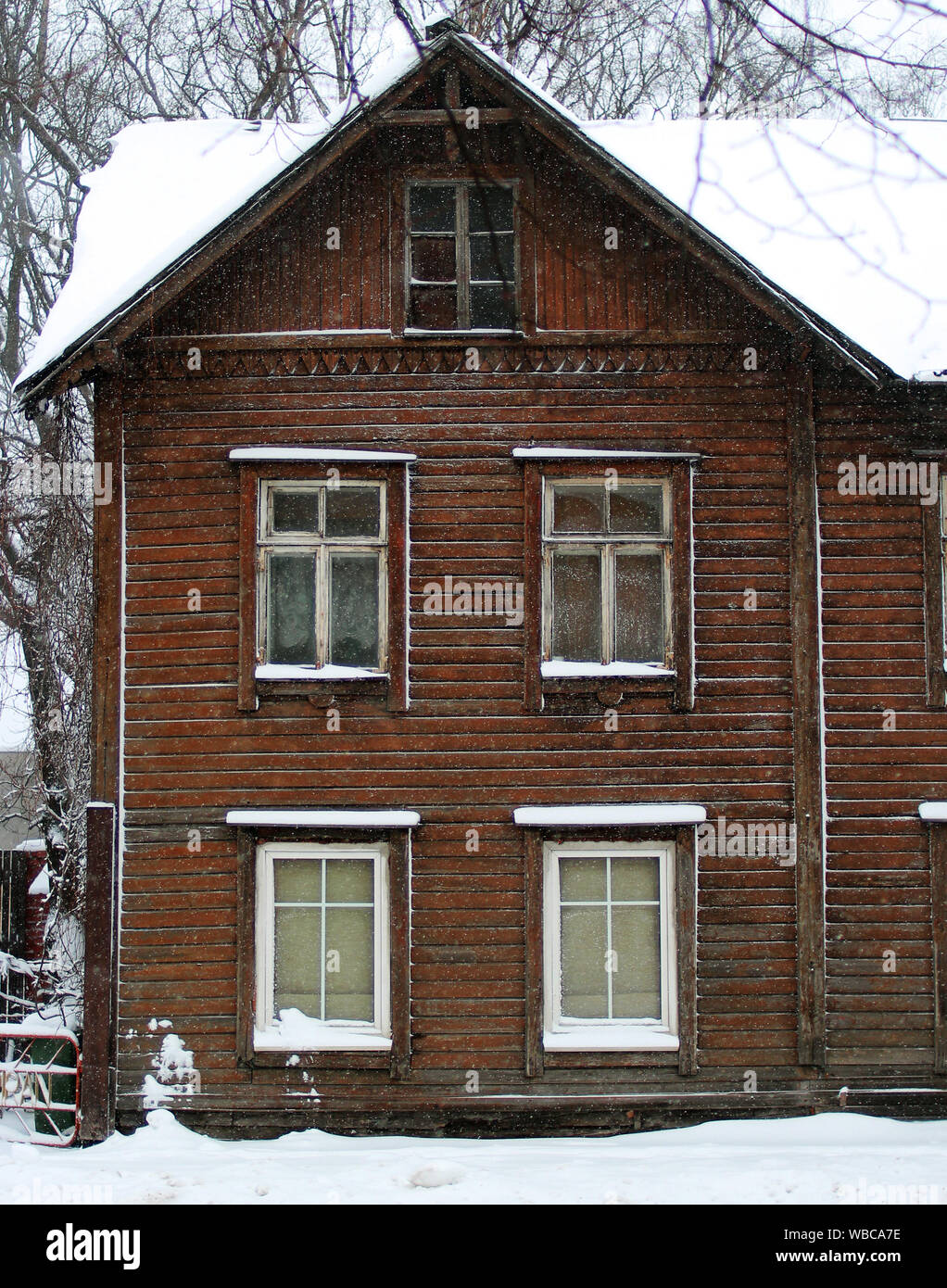 old wooden house in snowy town Stock Photo - Alamy