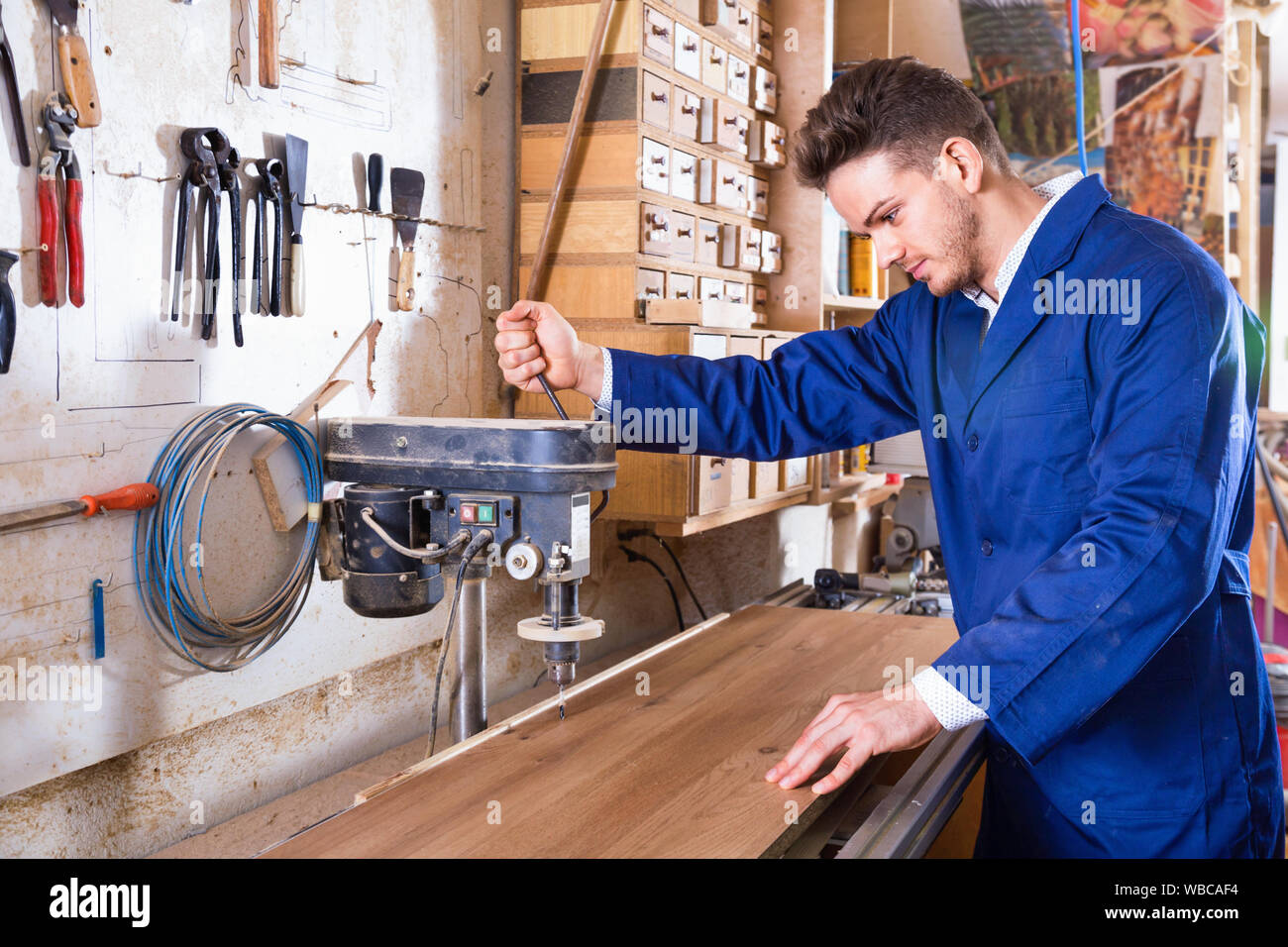 Smiling diligent friendly guy hi-res stock photography and images - Alamy