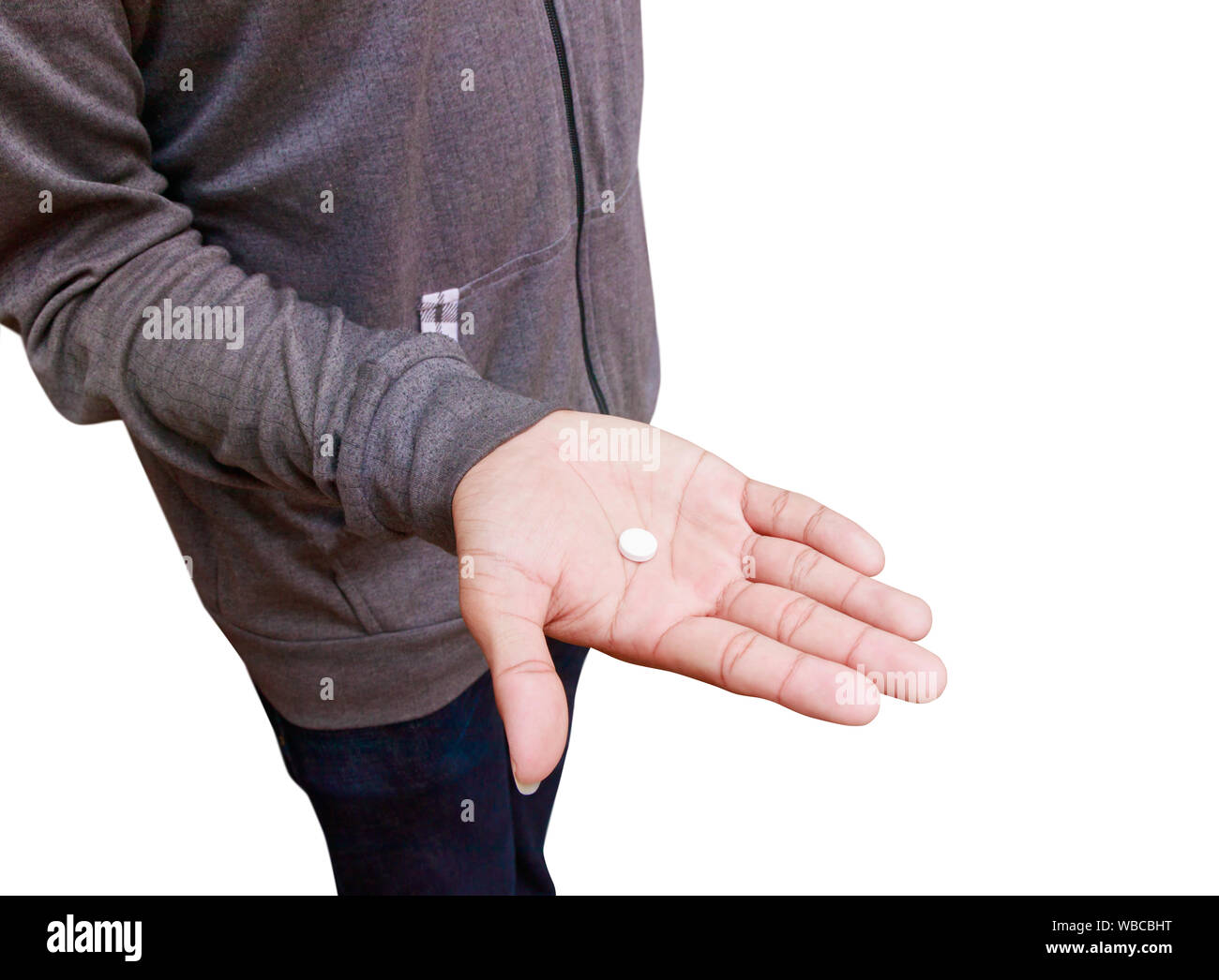 pills in hand male isolated on white background and clipping path. Stop ...