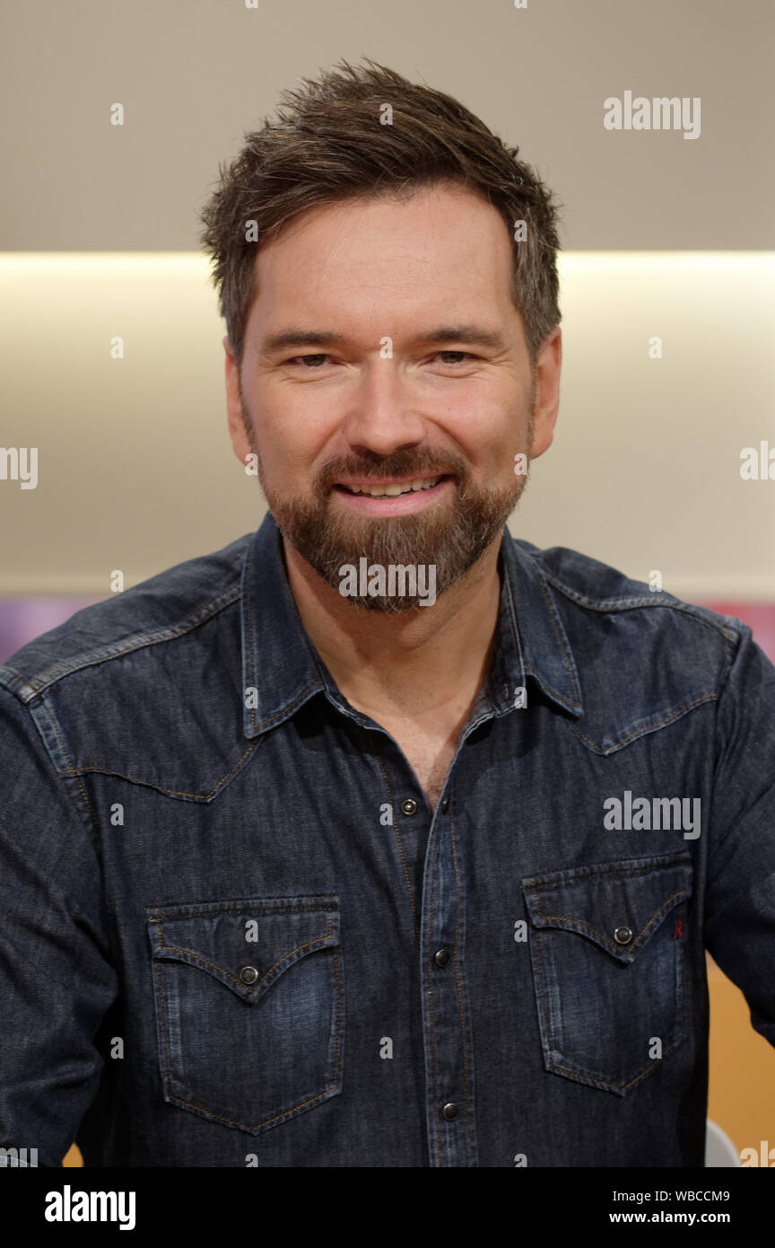 Cologne, Germany. 26th Aug, 2019. The presenter Ingo Nommsen sits in ...