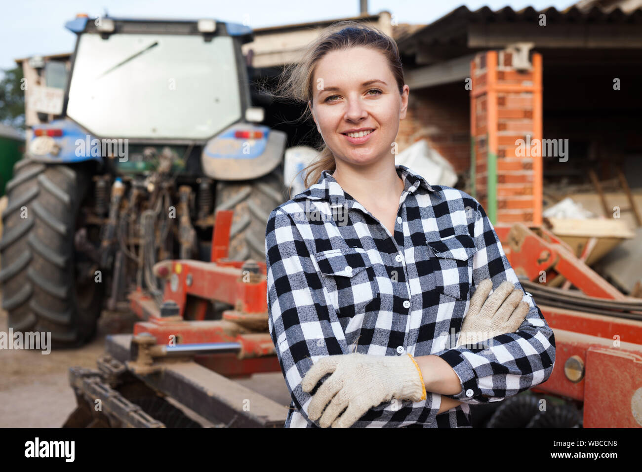 Woman driving tractor cabin hi-res stock photography and images - Alamy