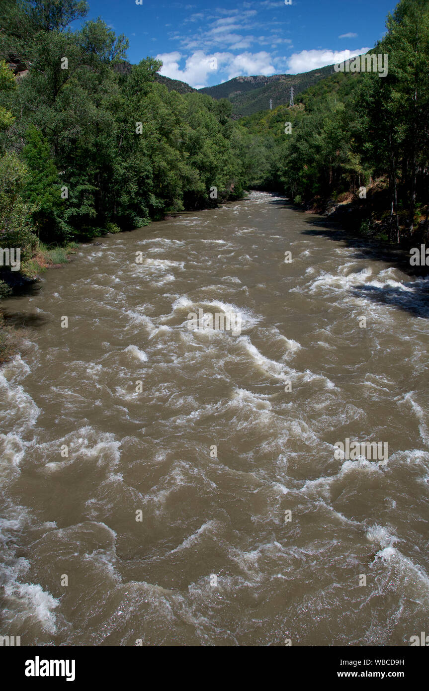 Wild river flow on the Noguera Pallaresa river between Sort and ...