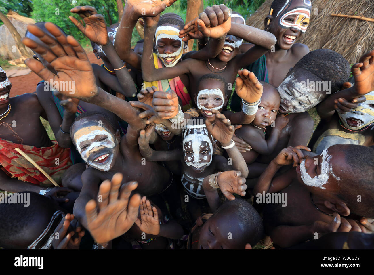 Suri tribal children at a ceremony in a village near Kibish, South Omo ...