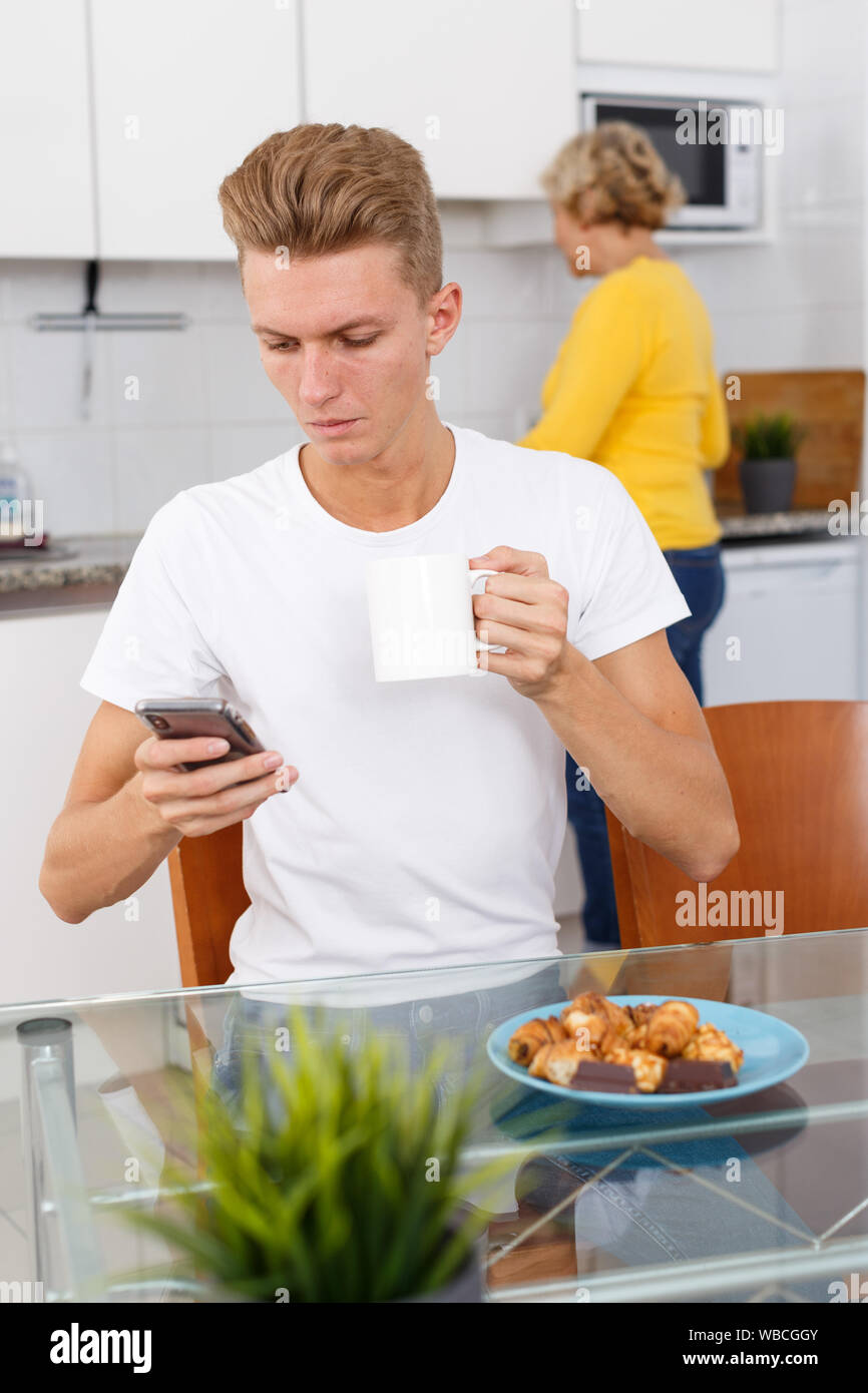 Older man with his mother cooking hi-res stock photography and images ...