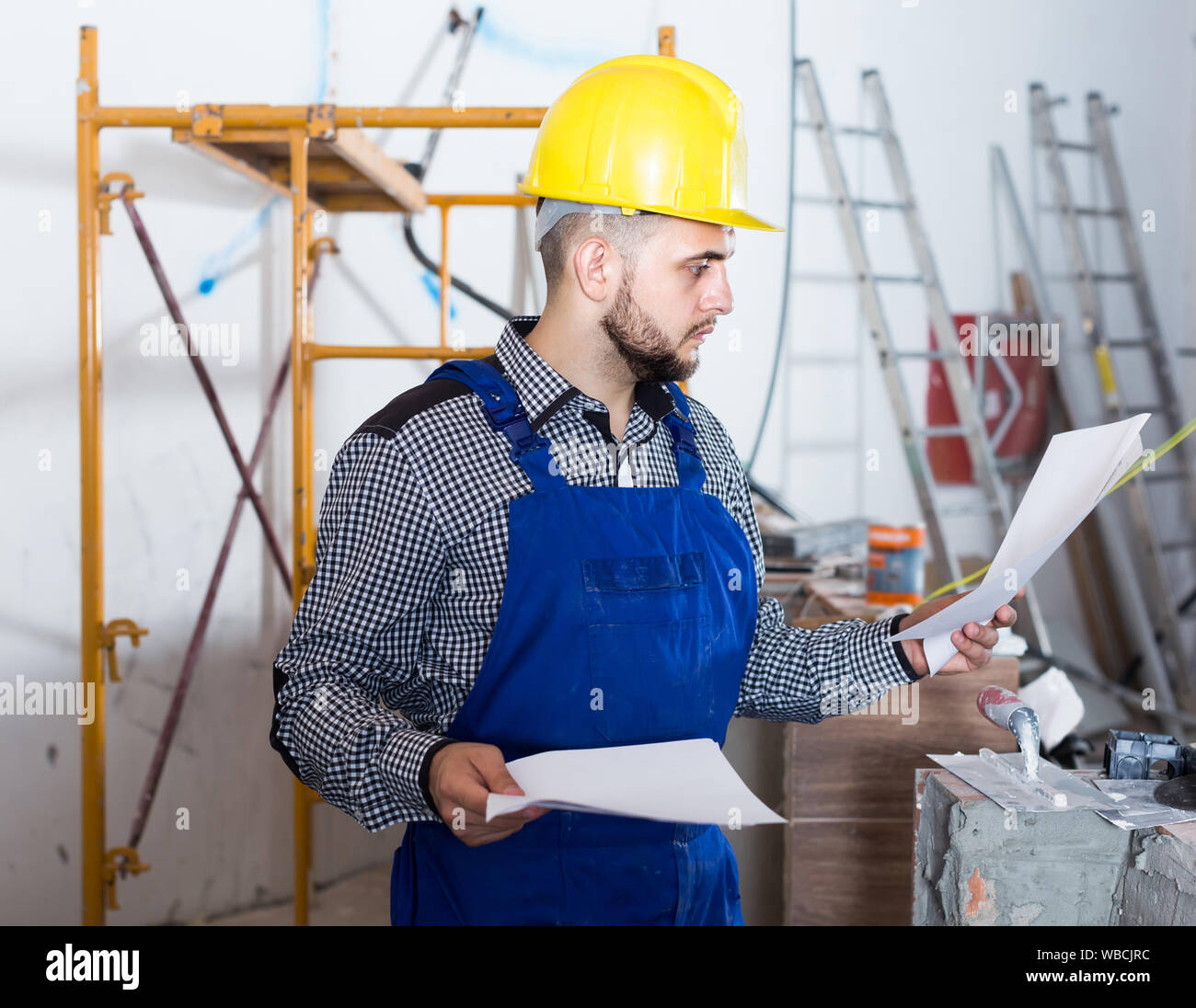 Positive spanish male worker hi-res stock photography and images - Alamy