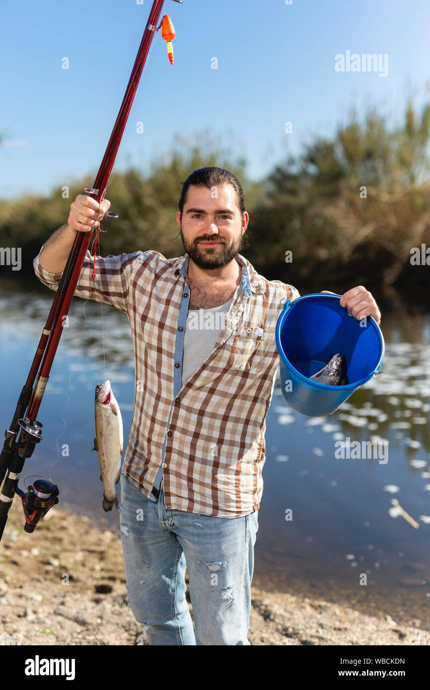 Happy fisherman hi-res stock photography and images - Alamy