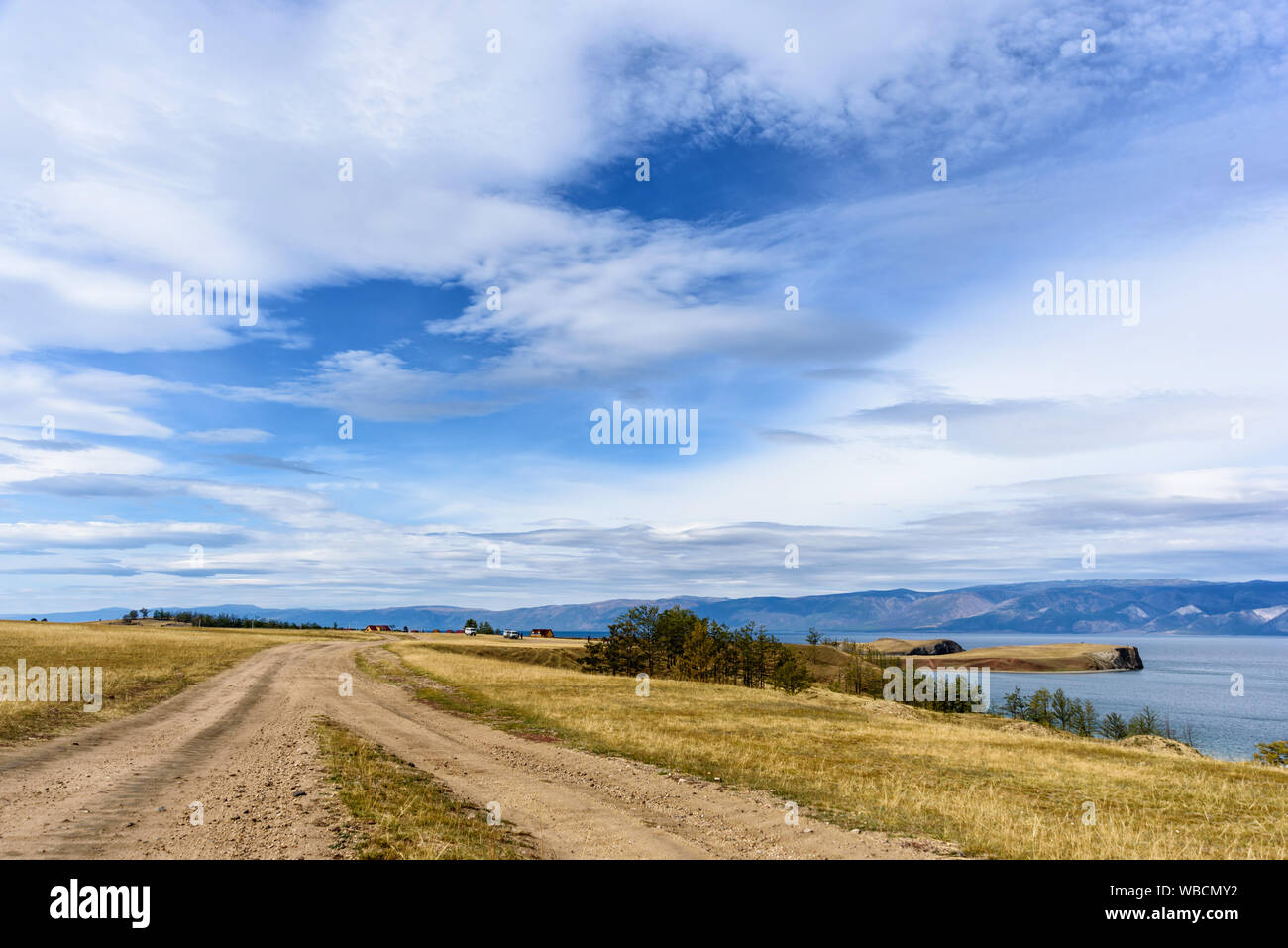 Lake Baikal and mountains of Siberia with beautiful sky and clouds ...