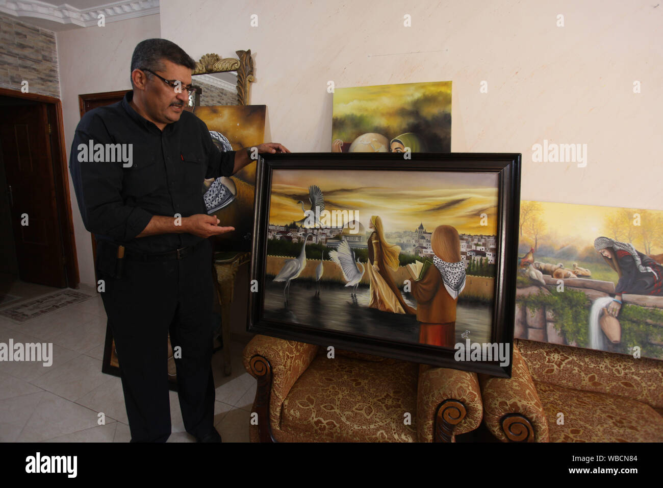 Nablus. 26th Aug, 2019. Palestinian artist Wael Rabie displays his ...