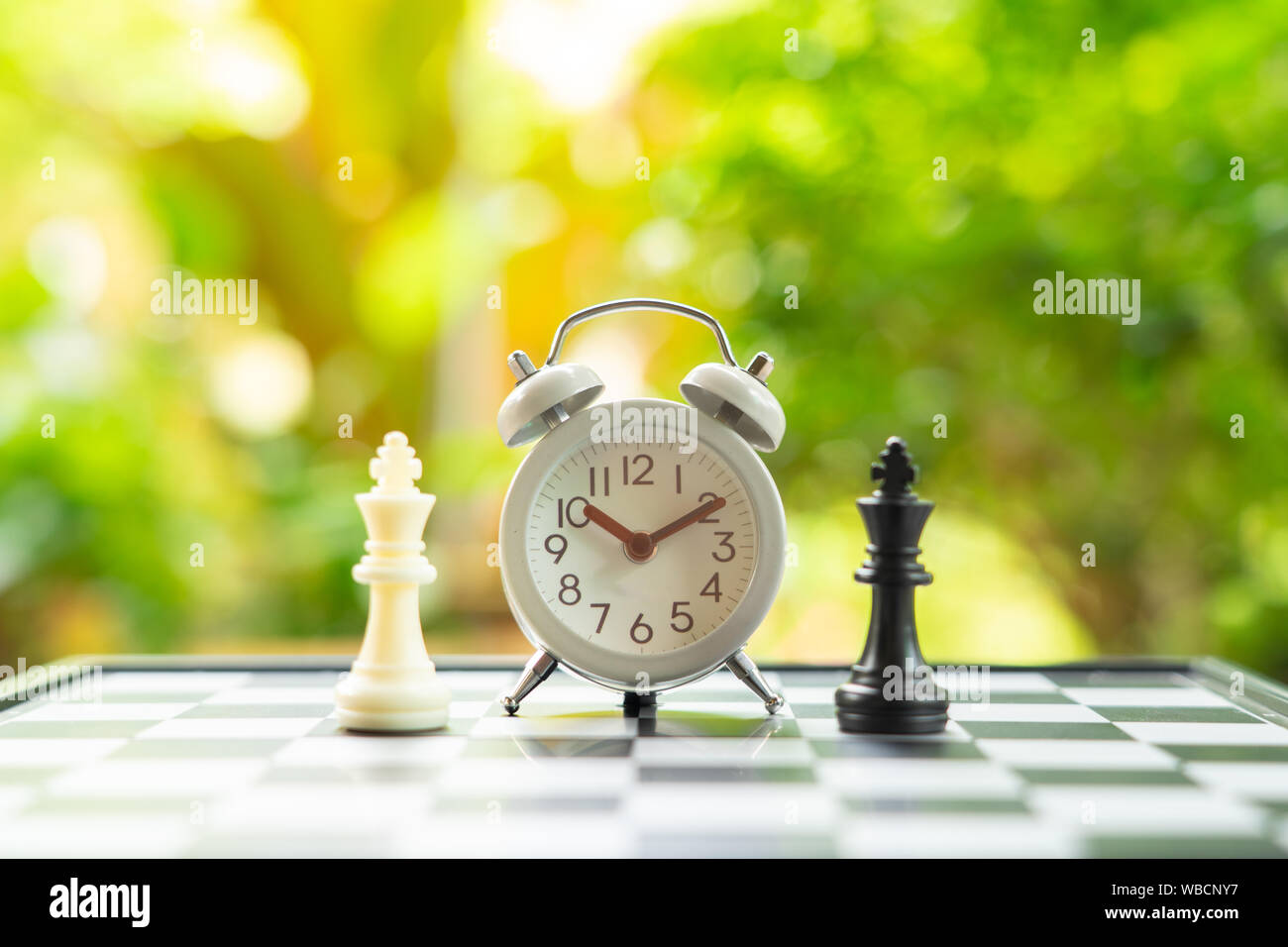 chessboard with a chess piece on the back Negotiating in business. as ...