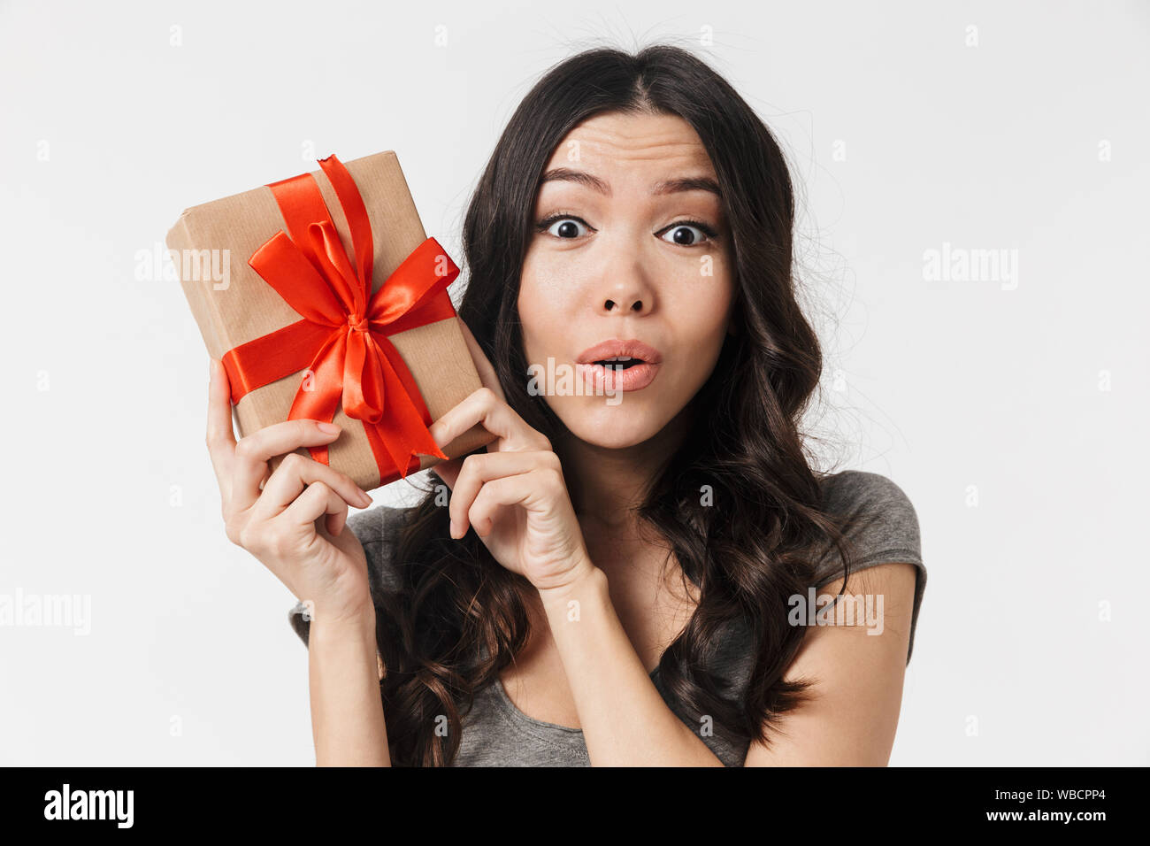 Image of a shocked beautiful excited young woman posing isolated over ...