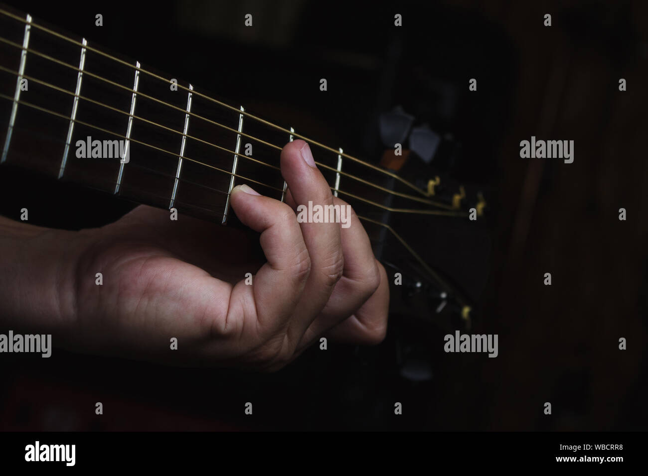 Acoustic Guitar Player Performing. Guitarist Playing In Music Studio ...