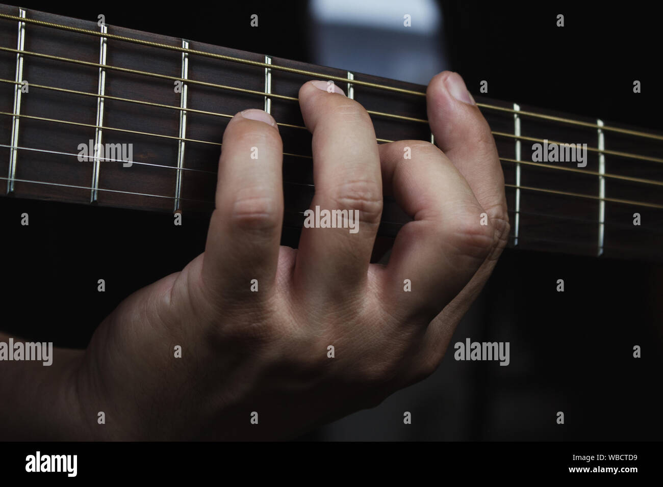 Acoustic Guitar Player Performing. Guitarist Playing In Music Studio ...