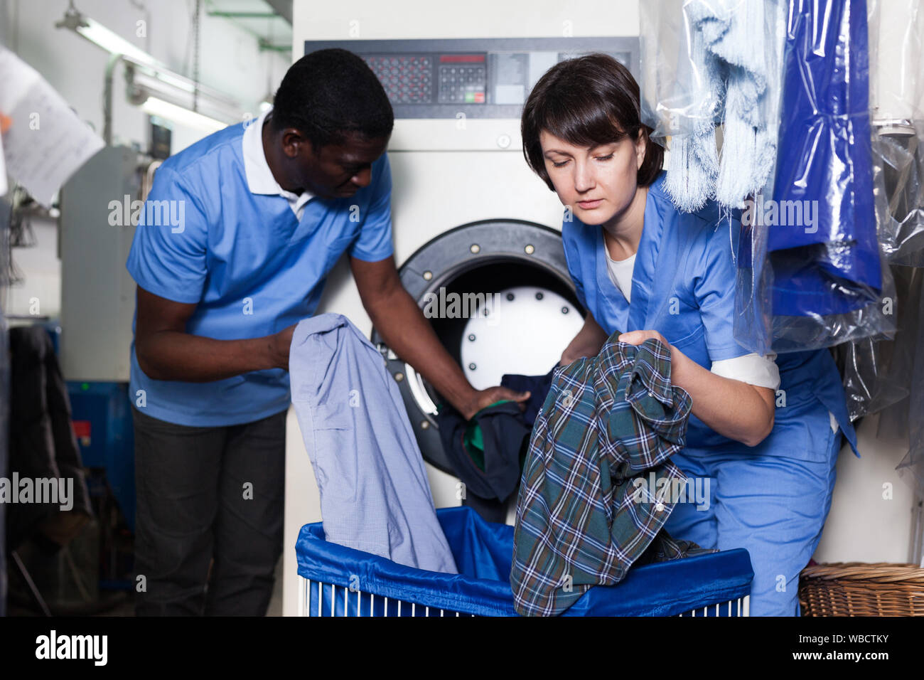 Sorting laundry african hi-res stock photography and images - Alamy