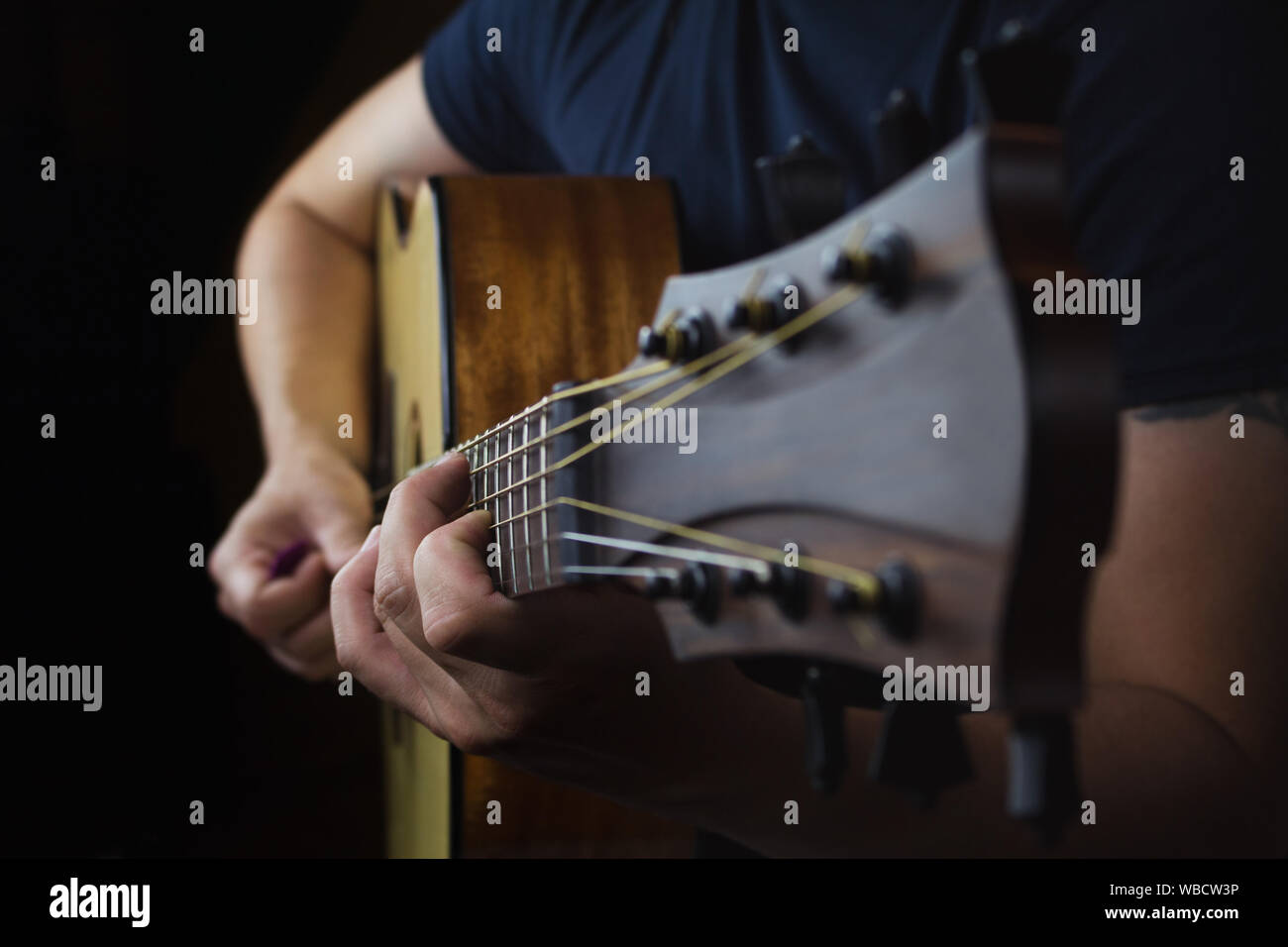 Acoustic Guitar Player Performing. Guitarist Playing In Music Studio ...