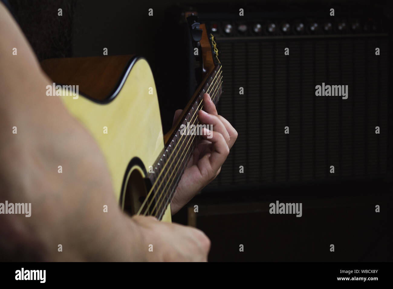 Acoustic Guitar Player Performing. Guitarist Playing In Music Studio ...