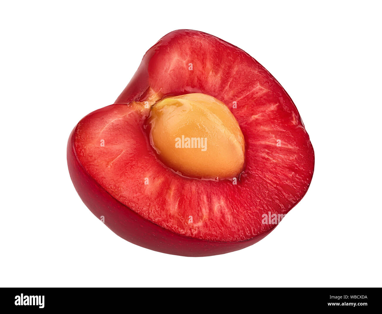 half cherry closeup isolated on white background Stock Photo - Alamy