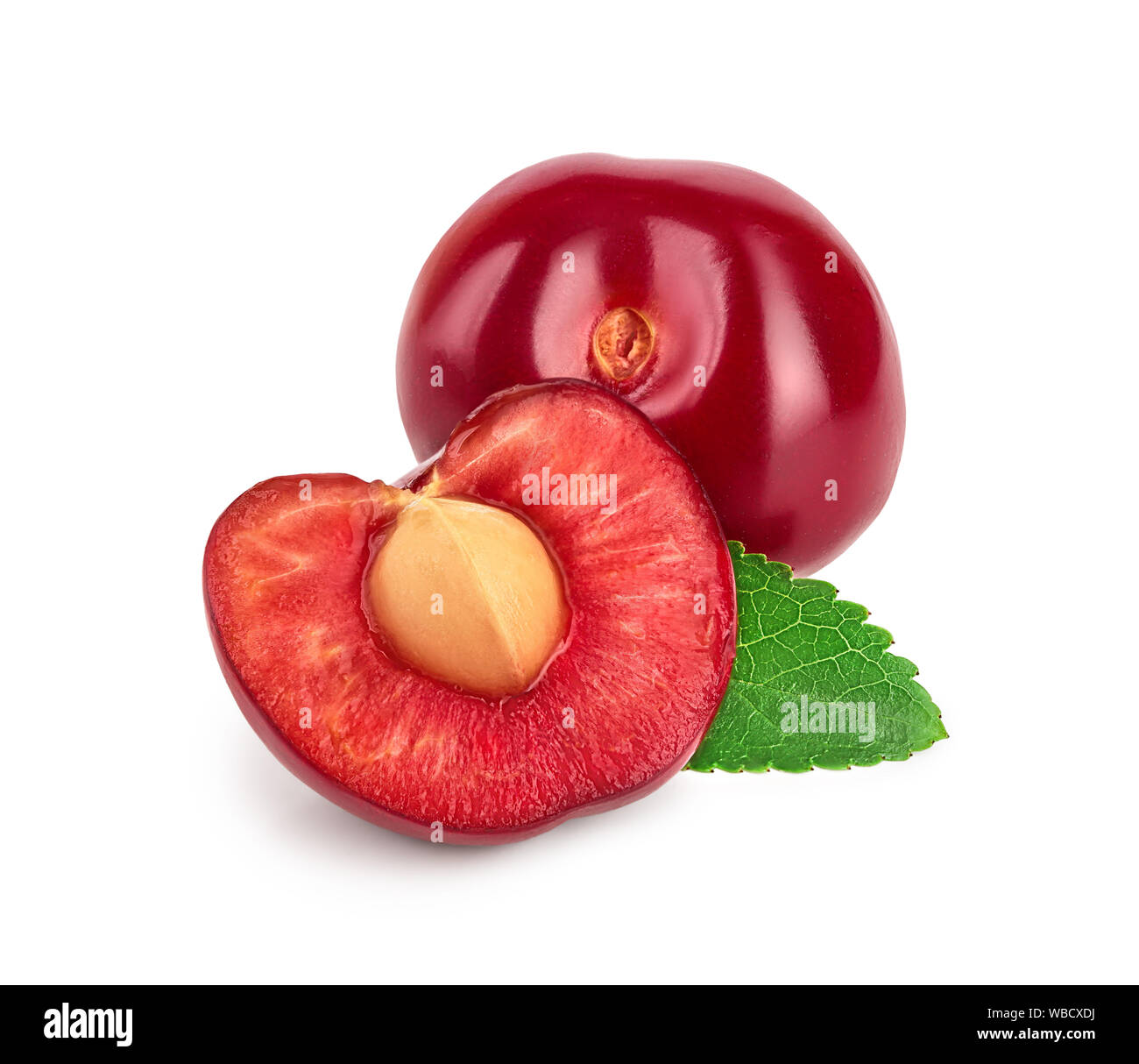 cherry with leaf and half closeup isolated on white background Stock ...
