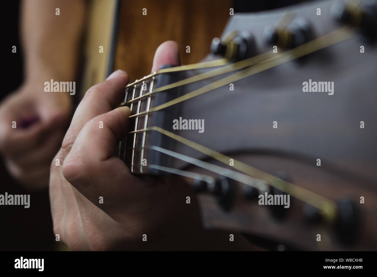 Acoustic Guitar Player Performing. Guitarist Playing In Music Studio ...
