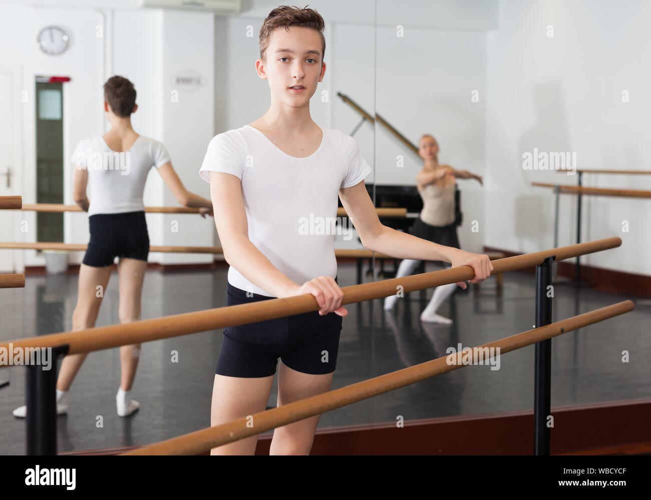 Young dancer looks at the dancing woman choreographer Stock Photo - Alamy