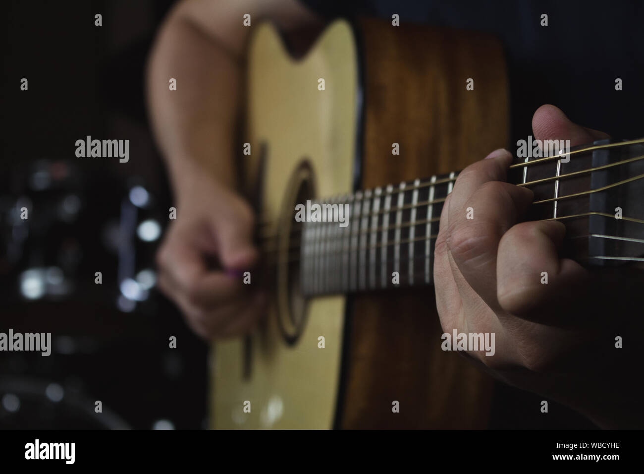Acoustic Guitar Player Performing. Guitarist Playing In Music Studio ...
