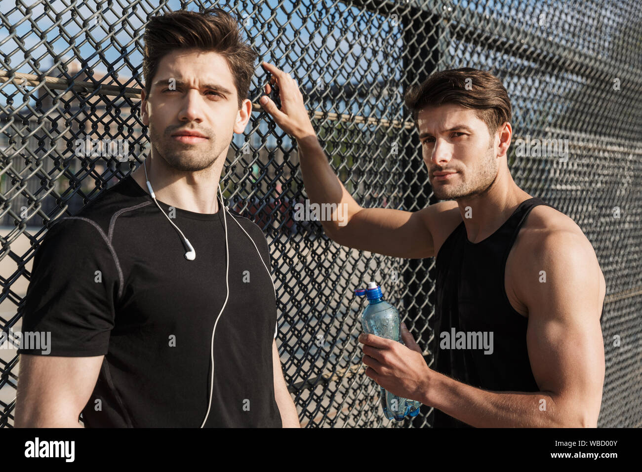 Talking Over Fence High Resolution Stock Photography and Images - Alamy