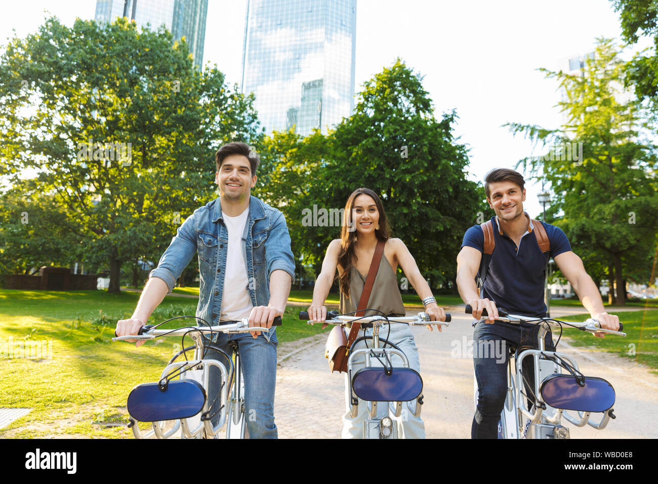 Bike ride together friends cycling woman bicycles hi-res stock ...