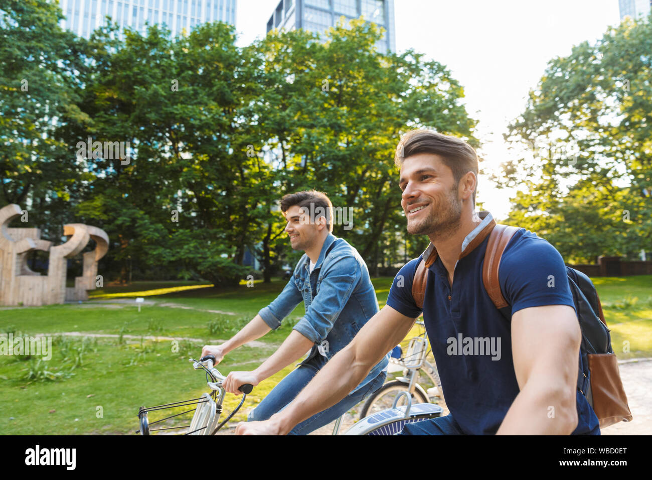 Two male friends enjoying cycling hi-res stock photography and images ...