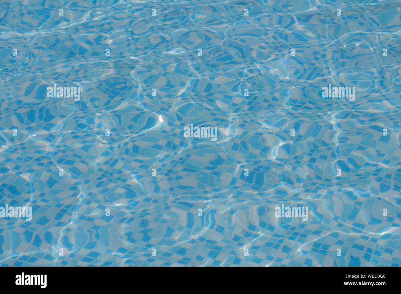 Ripple of pool water with sun reflection. Blue pool rippled water Stock ...