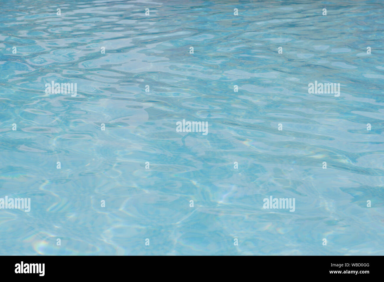 Ripple of pool water with sun reflection. Blue pool rippled water Stock ...