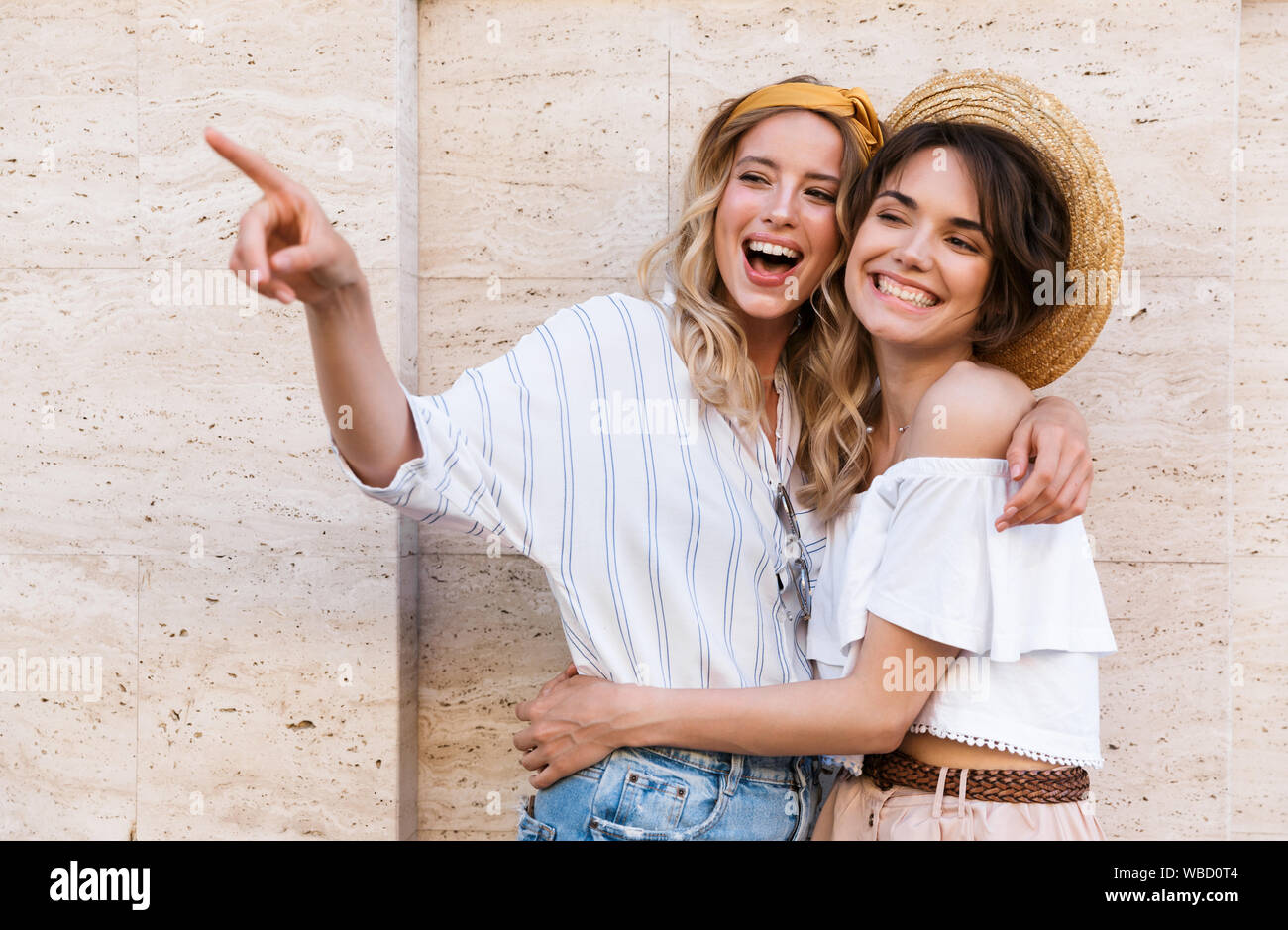 Image of a emotional smiling positive young girls friends posing ...