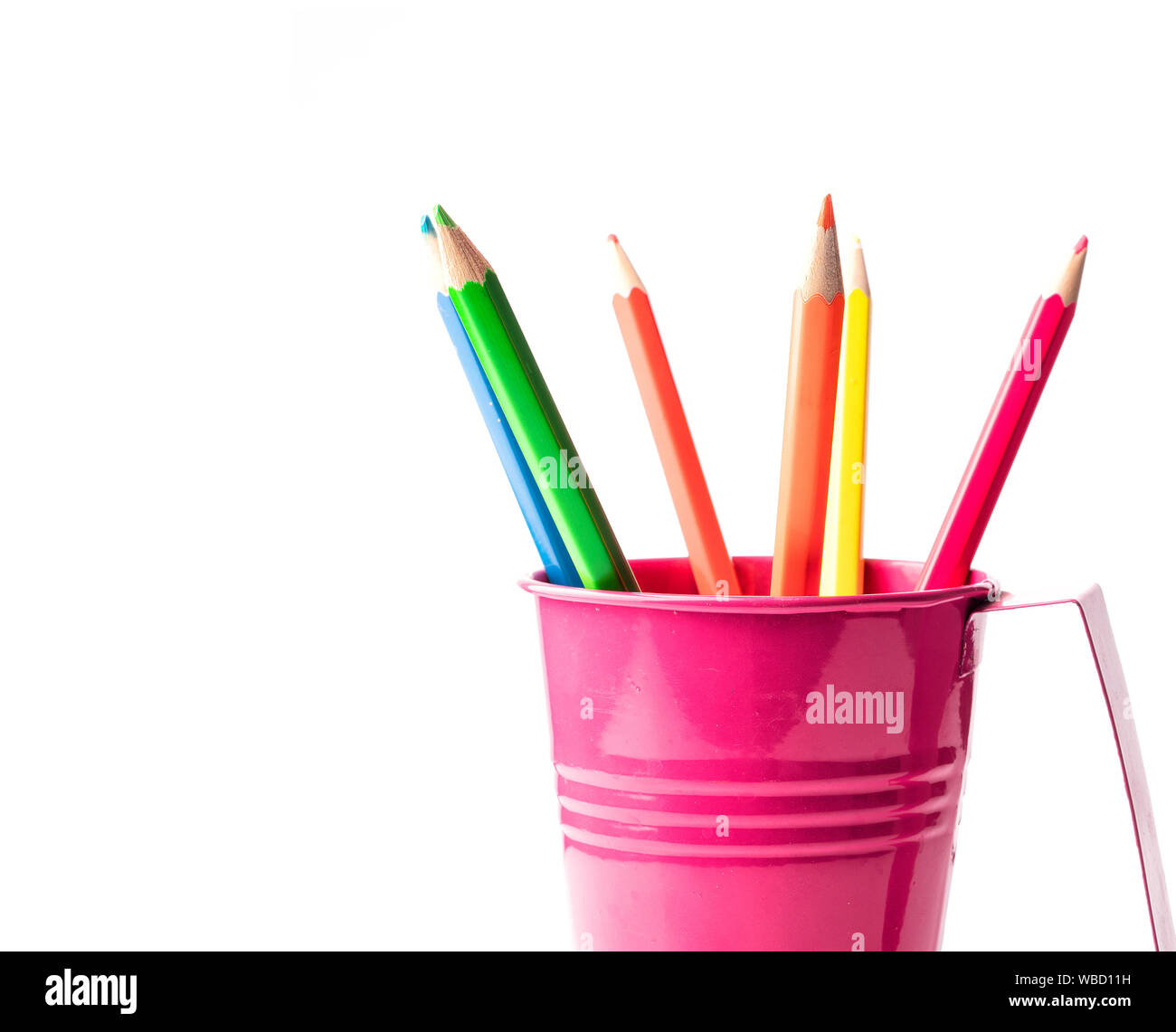 Colorful pencils in pail isolated on white. Creative idea for drawing ...