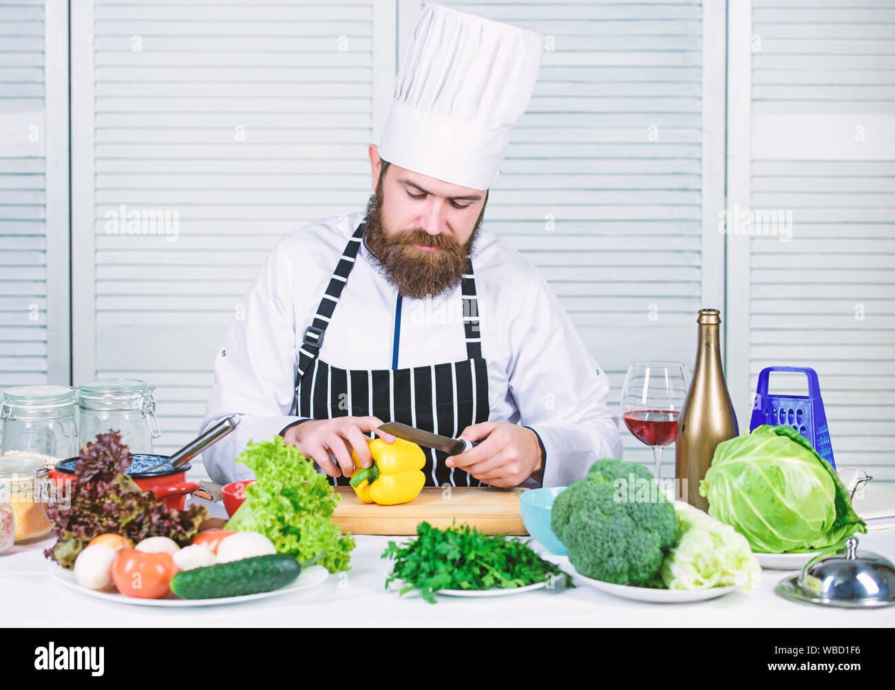 Basic cooking processes. Man master chef or amateur cooking food. Sharp ...