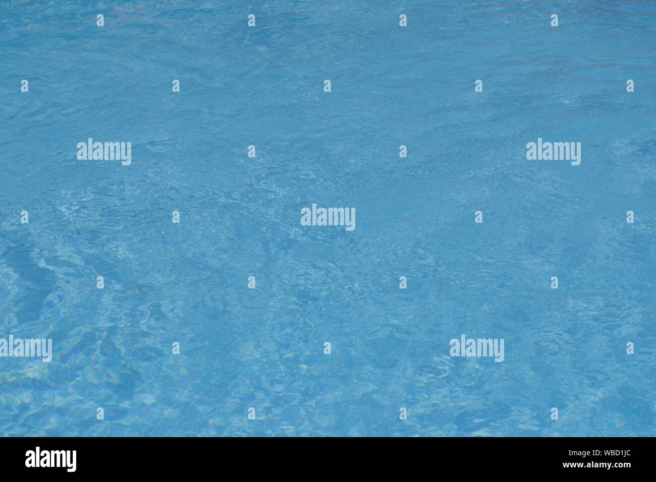Blue water in the pool. Blue pool rippled water. Azure water in the sea ...