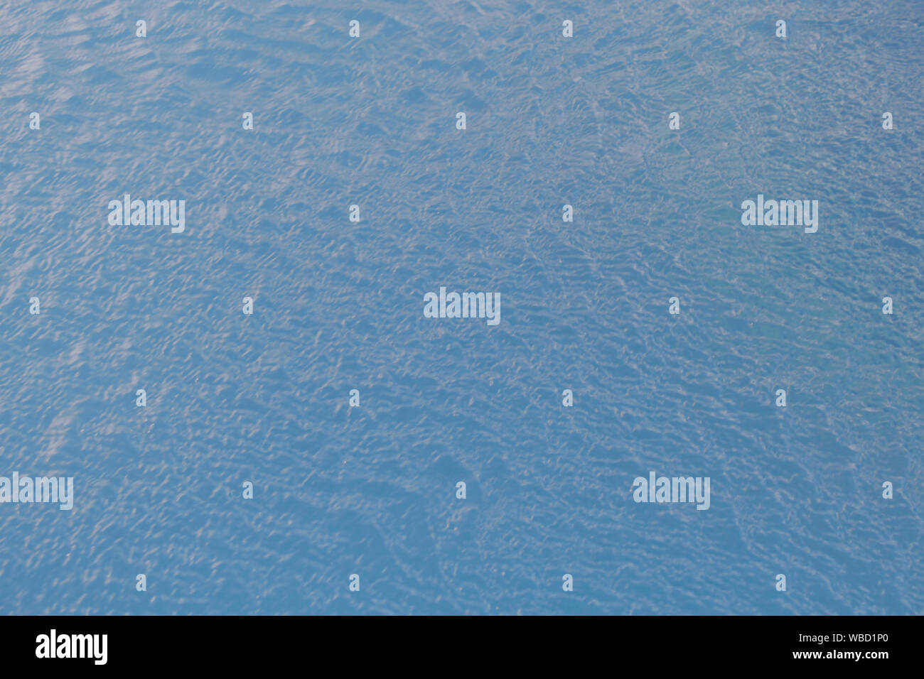 Blue water in the pool. Blue pool rippled water. Azure water in the sea ...