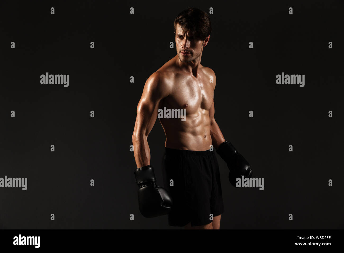 Concentrated muscular sportsman in white hi-res stock photography and ...