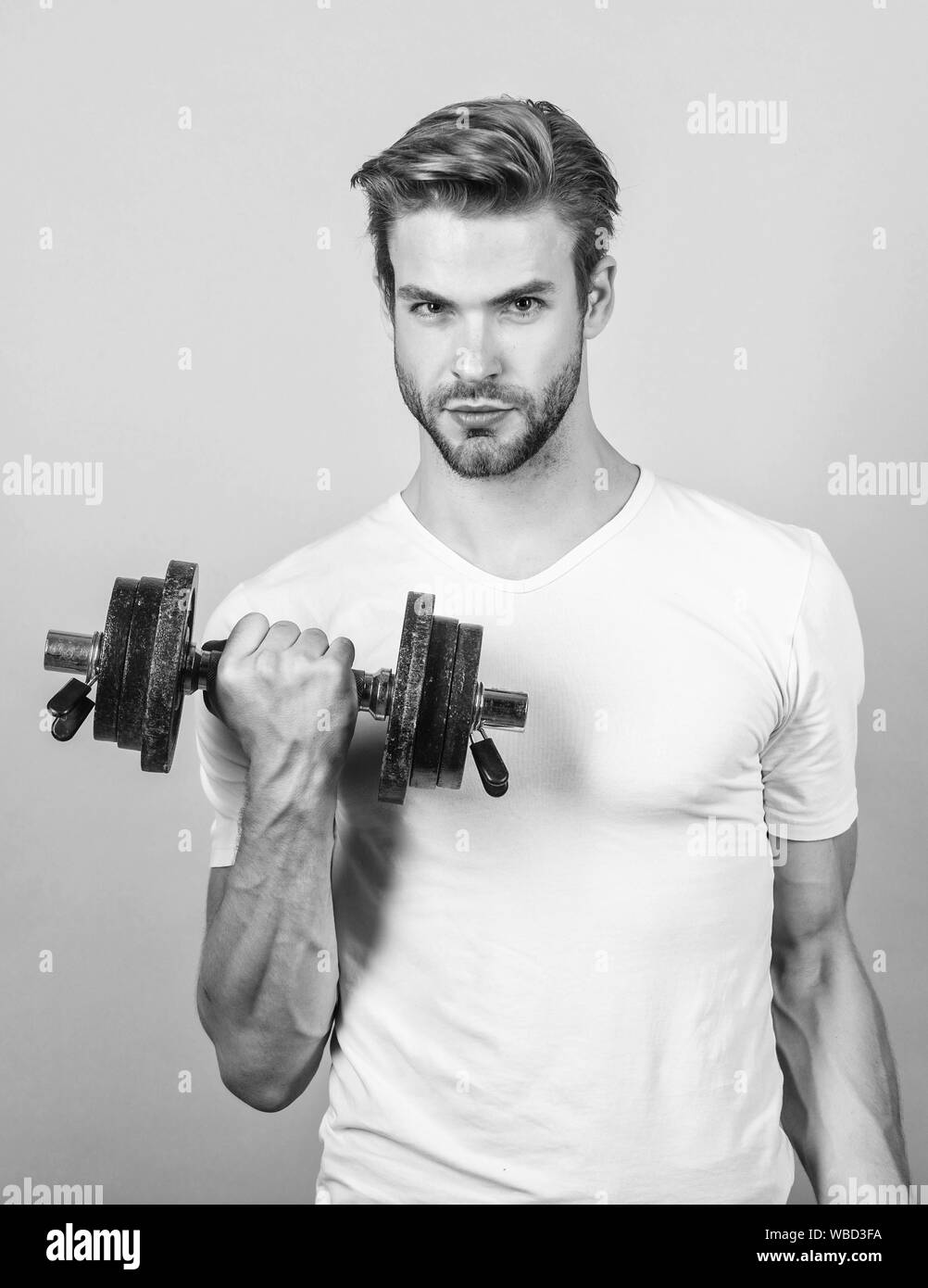 mens power. man lifting barbell. sportsman training in gym. Sport ...
