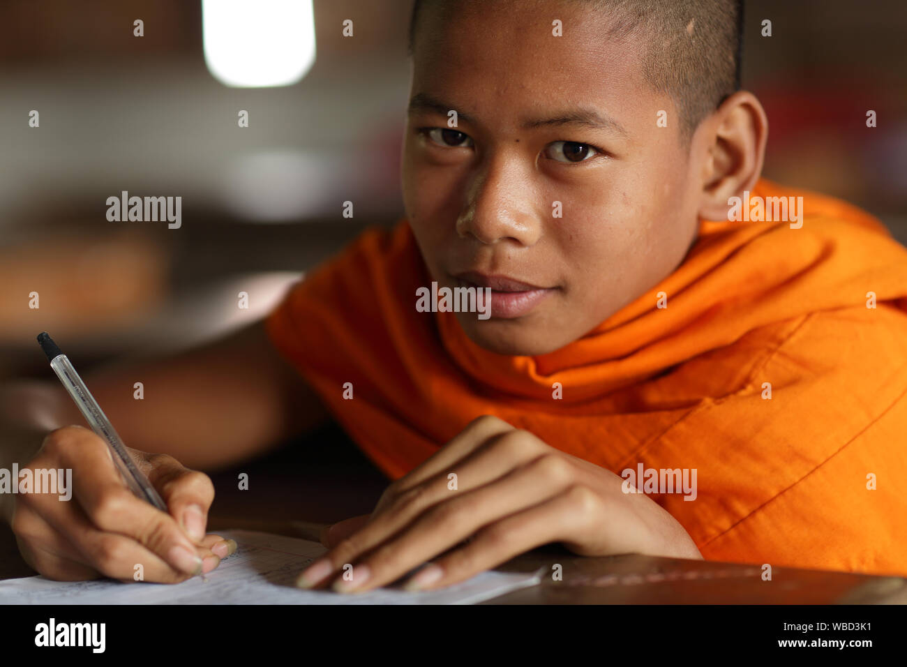 Buddhist novice in a monastic school in Luang Prabang, Laos. Buddhism ...