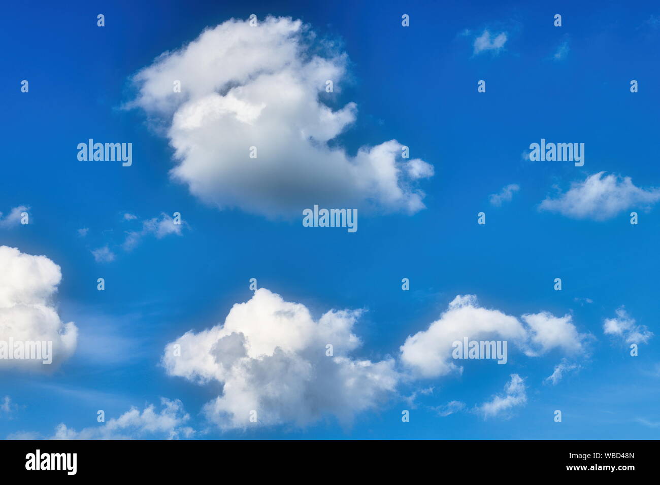 Blue sky background with white clouds. Beautiful nature wallpaper for background Stock Photo - Alamy
