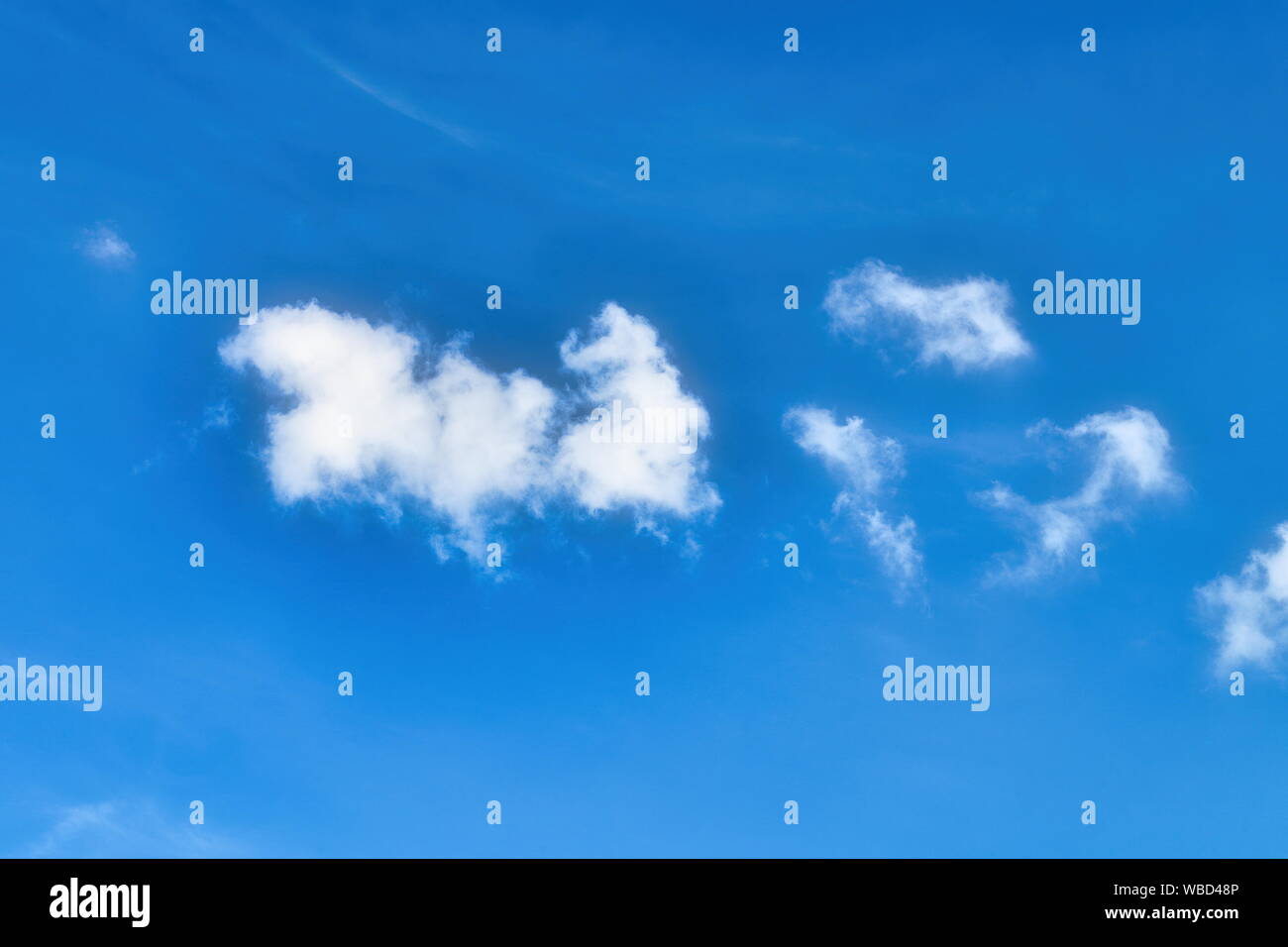 Blue sky background with white clouds. Beautiful nature wallpaper for background Stock Photo - Alamy